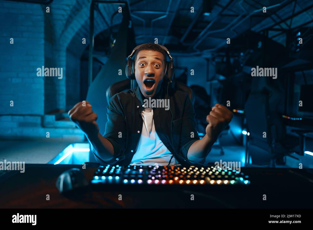 Victory in the cyber game. Portrait of a man who won Stock Photo - Alamy