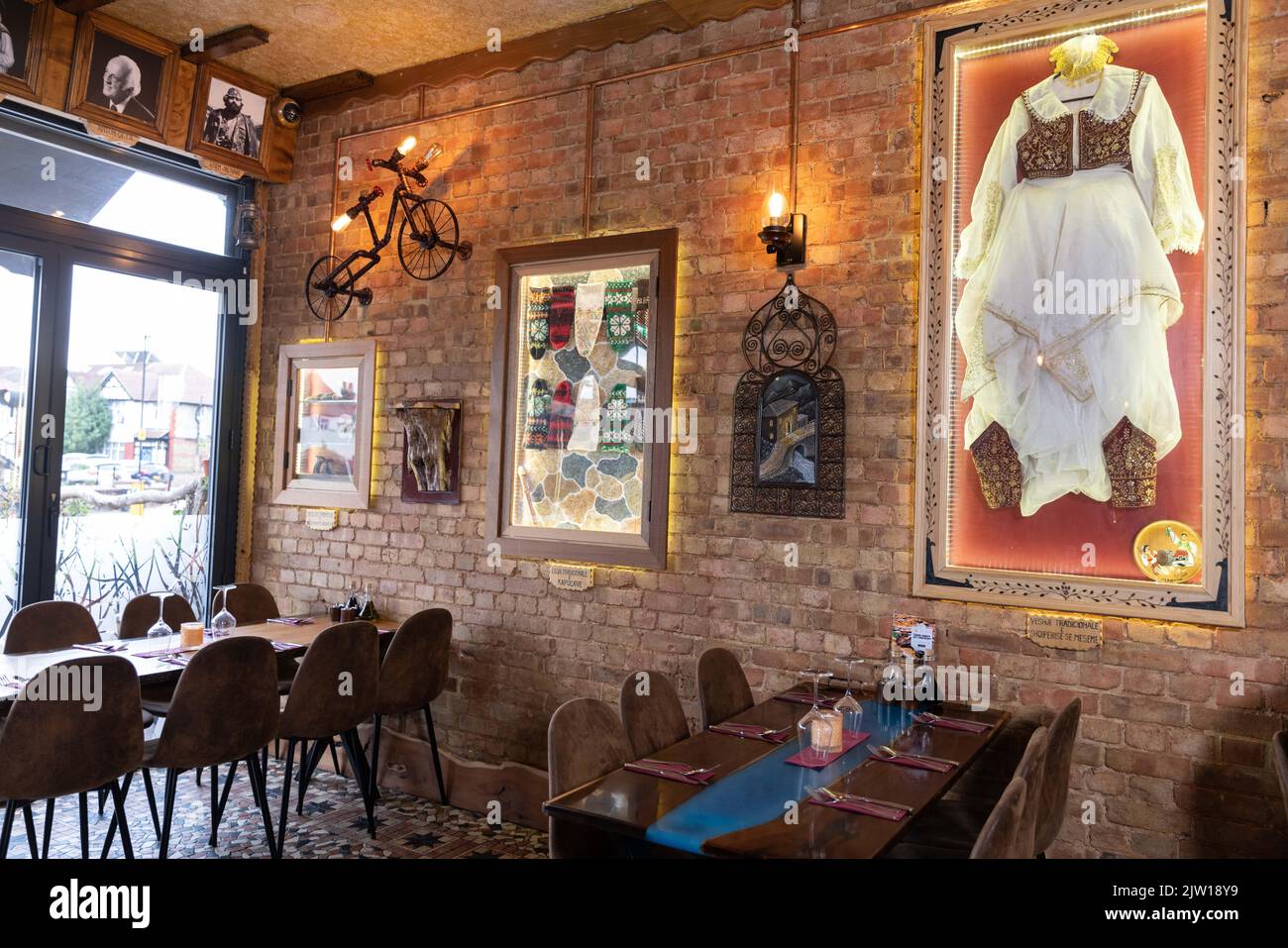ALBANIANS Olti Bokciu, the owner of the Illyrian Grill House, an ...