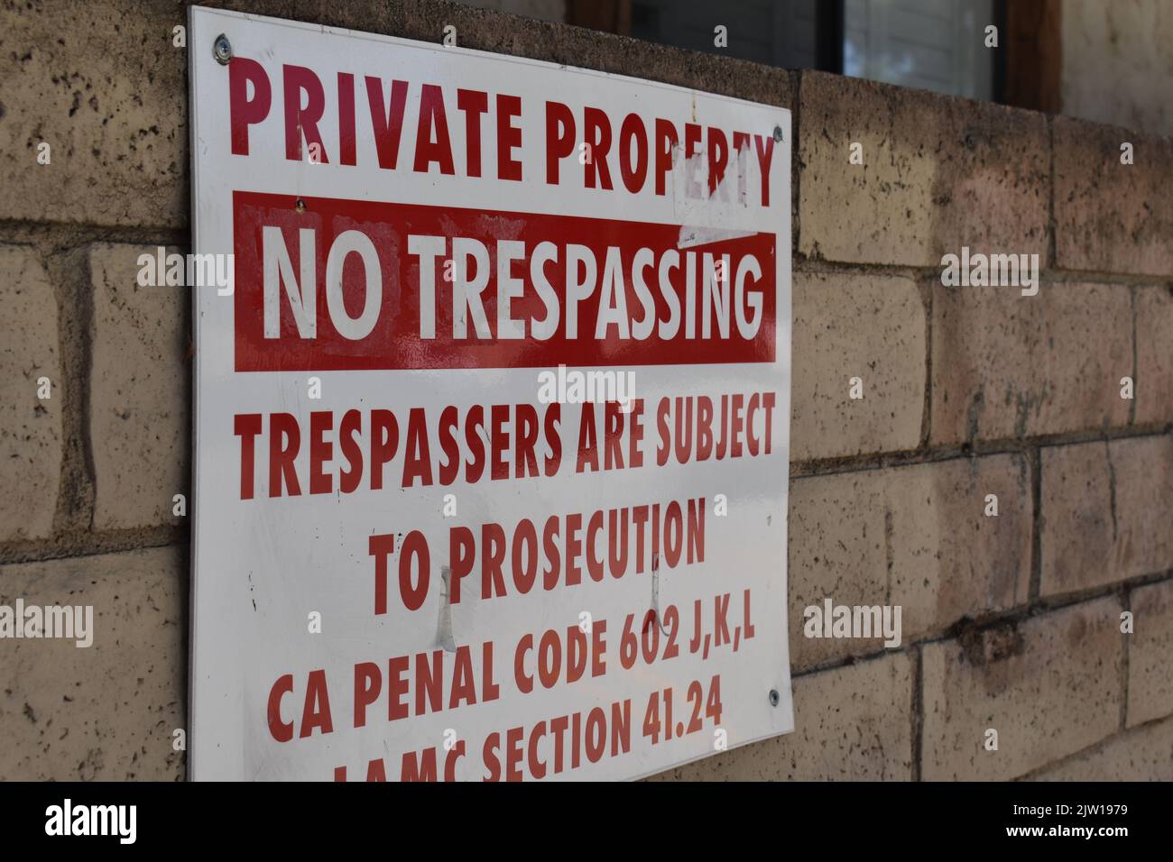 Private Property sign on brick wall Stock Photo - Alamy