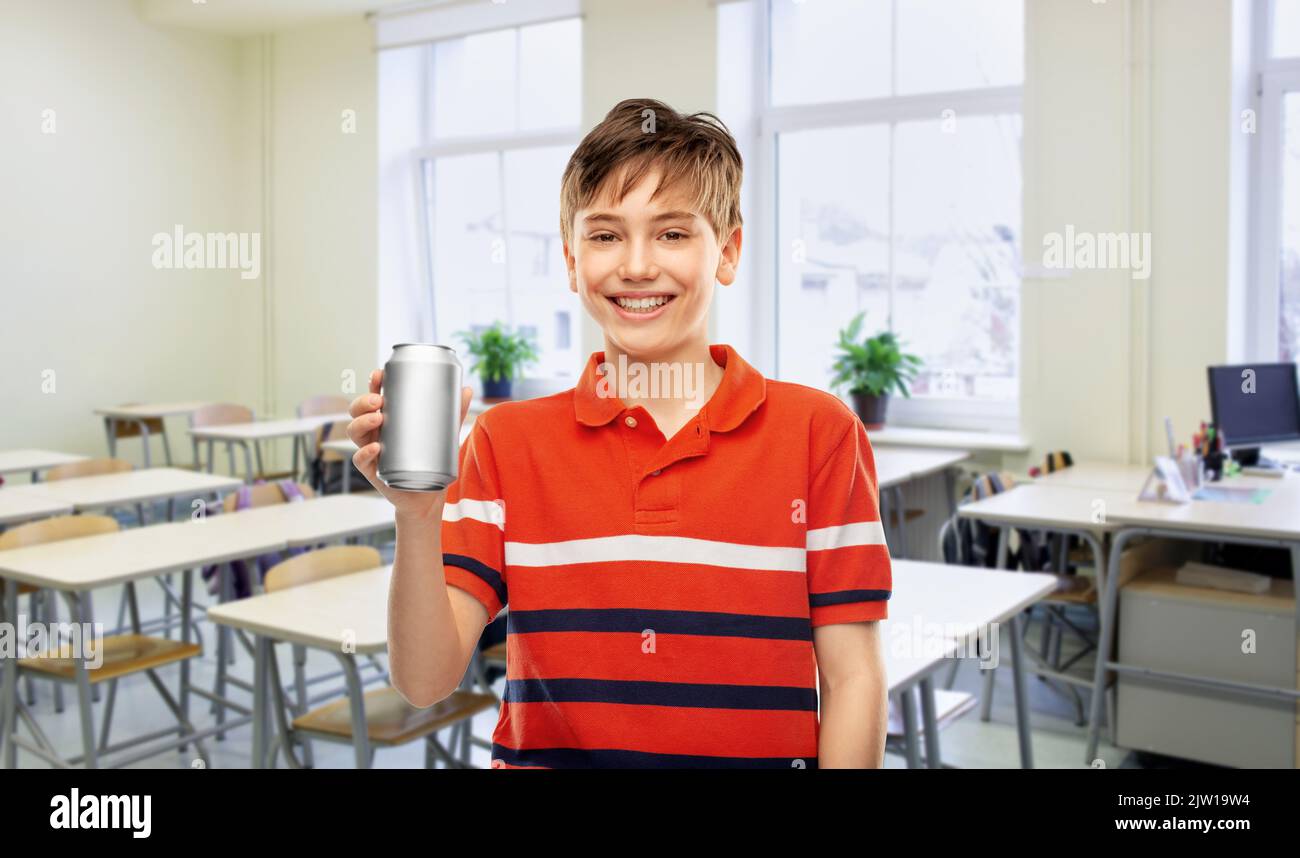 smiling student boy with can drink at school Stock Photo - Alamy