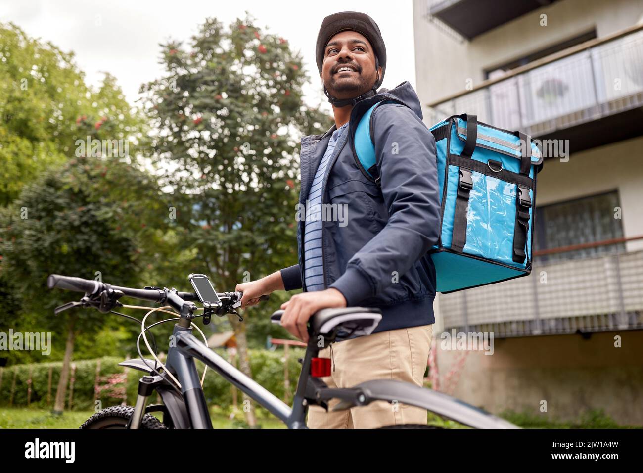 Indian bike delivery boy hi-res stock photography and images - Alamy
