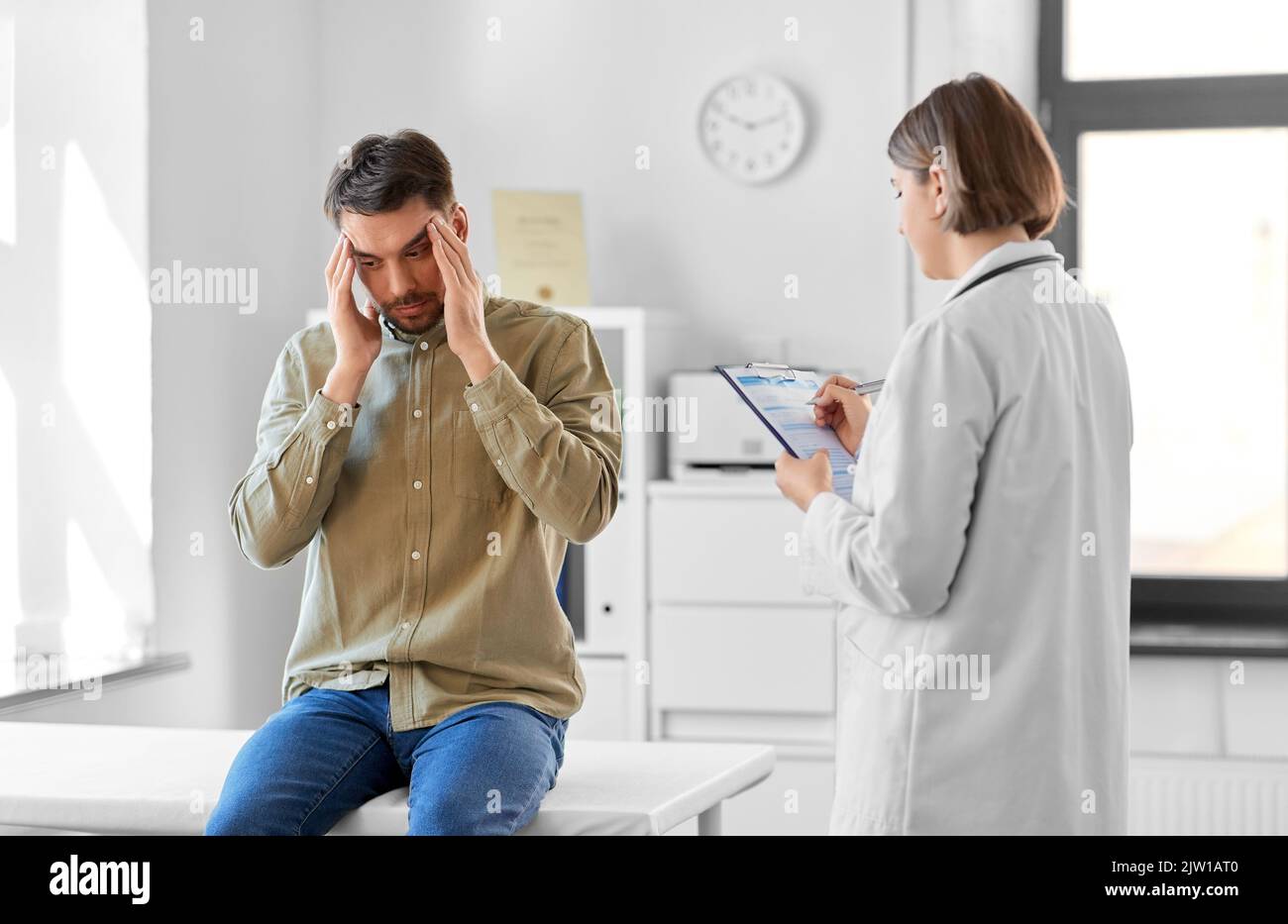 doctor and man with health problem at hospital Stock Photo - Alamy