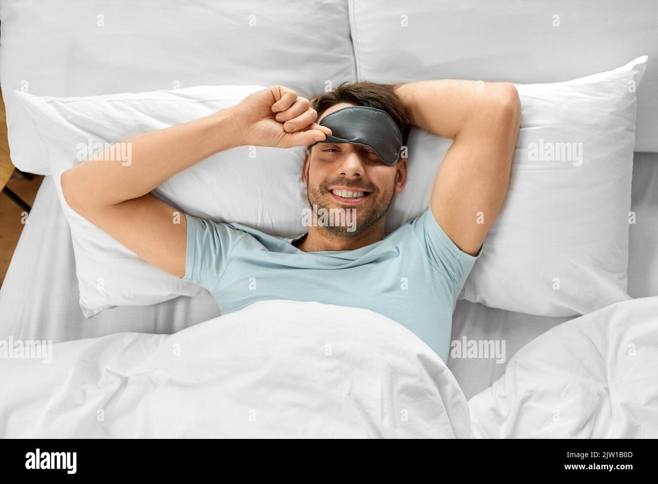 Hispanic man sleeping lying hi-res stock photography and images - Alamy