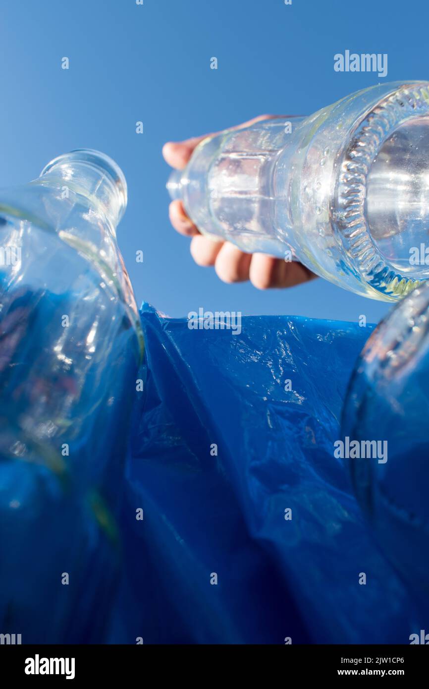 Man hold blue bin hi-res stock photography and images - Alamy