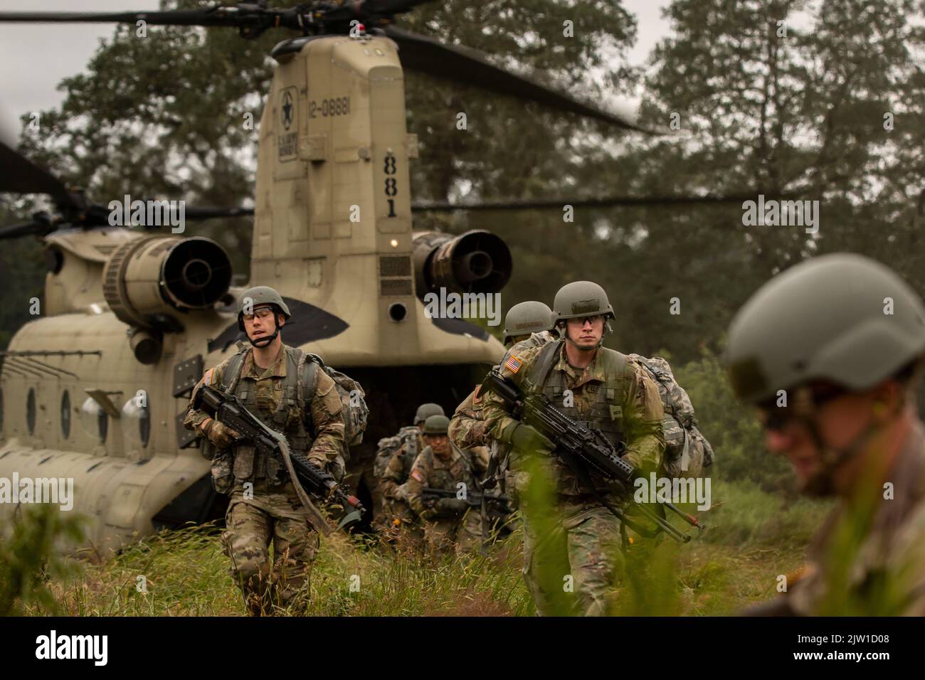 Army National Guard officer candidates disembark a CH-47 Chinook during ...