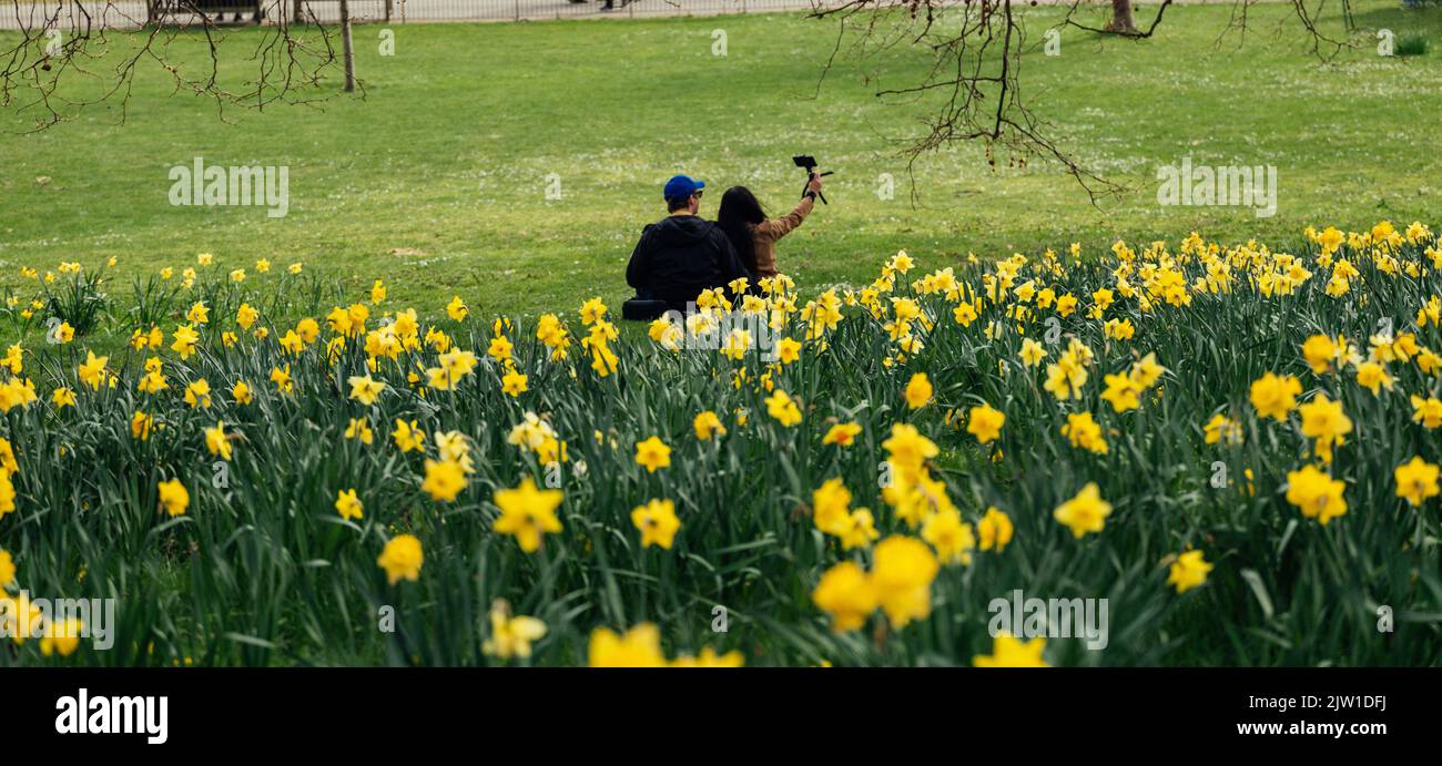 A beautiful romantic shot of a young couple taking a selfie on a ...