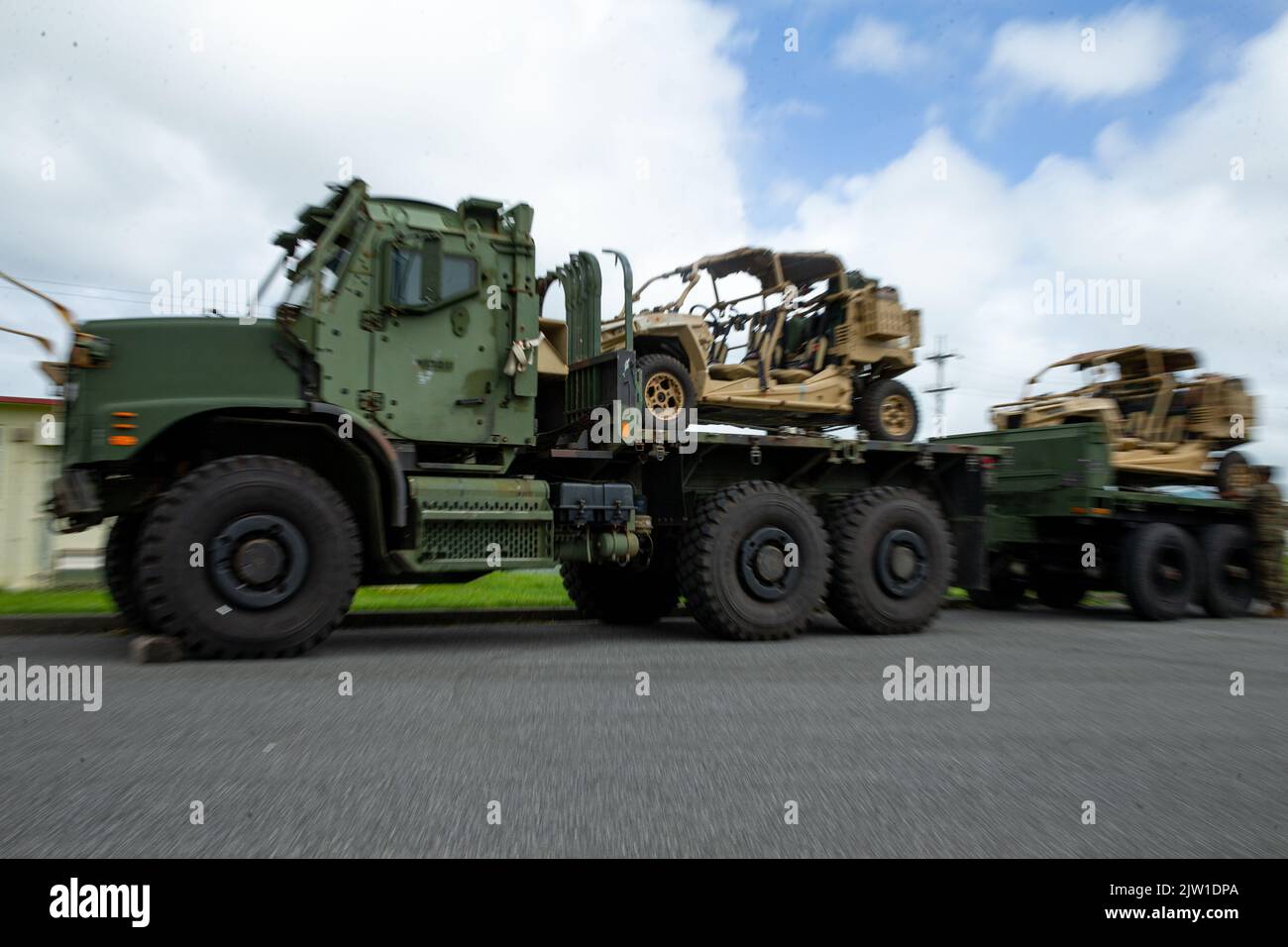 A U.S. Marine Corps Medium Tactical Vehicle Replacement with 3d Marine ...
