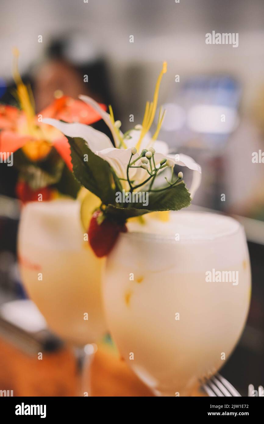 Alcoholic smoothie with fruits and tropical juices Stock Photo - Alamy