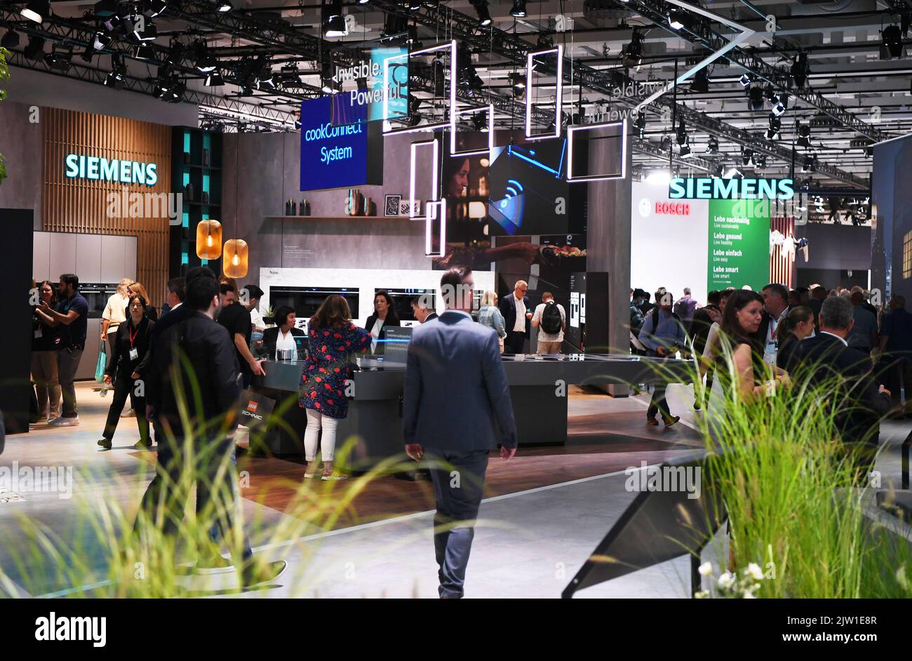 Berlin, Germany. 2nd Sep, 2022. People visit the booth of Siemens at ...