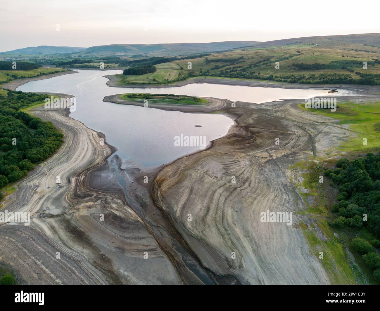 Drought conditions are shown through drone shots of Stocks Reservoir ...