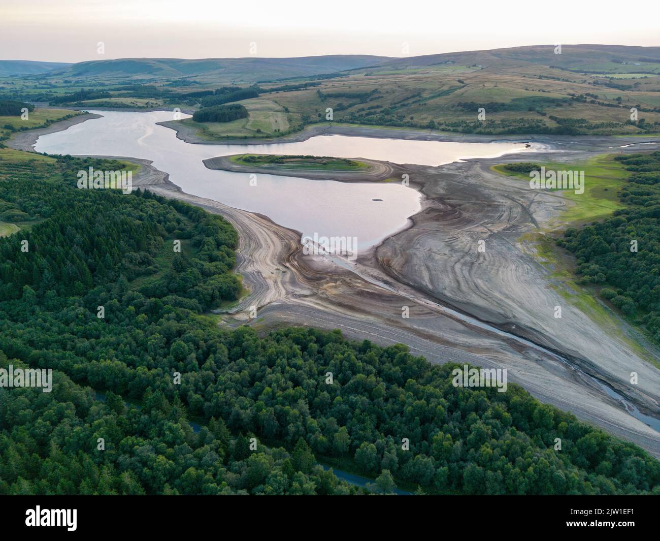 Drought conditions are shown through drone shots of Stocks Reservoir ...