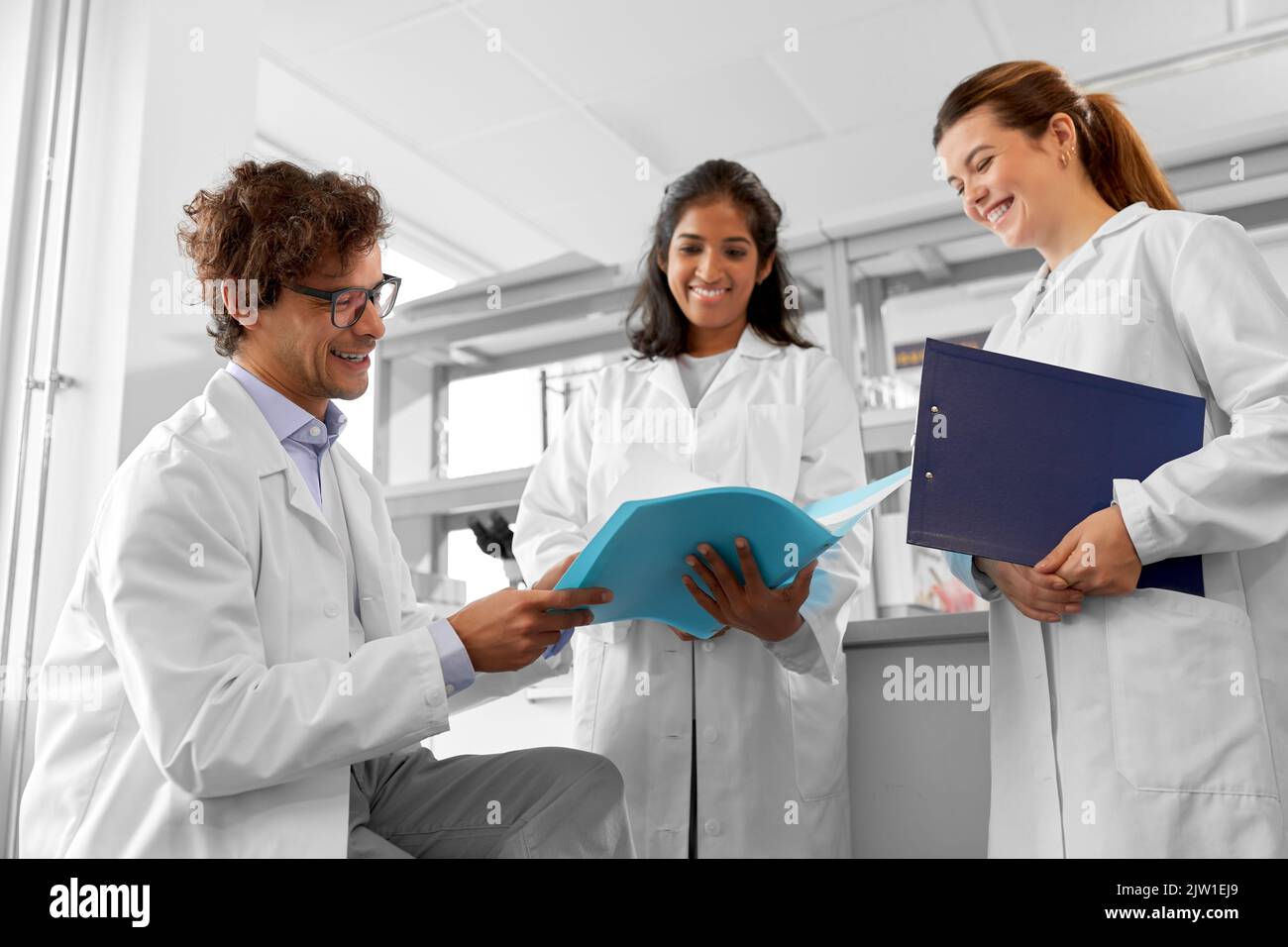 international group of scientists in laboratory Stock Photo - Alamy