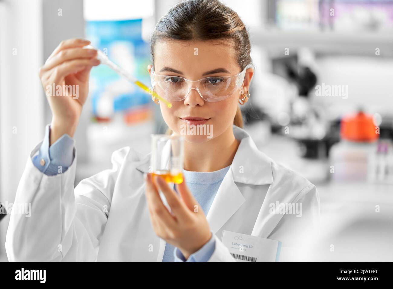 Laboratory chemist woman in goggles hi-res stock photography and images ...