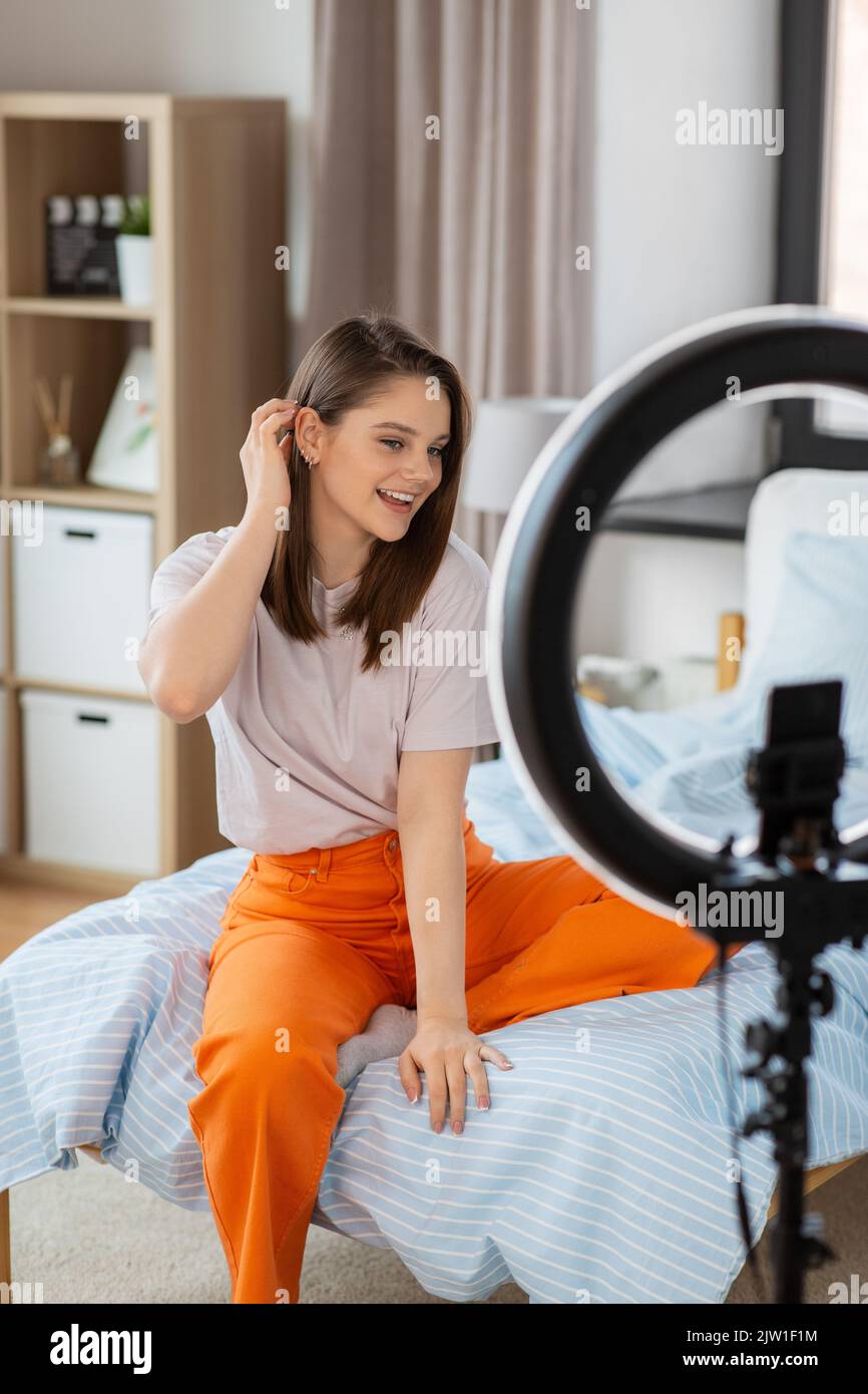 girl blogger with ring light streaming at home Stock Photo - Alamy