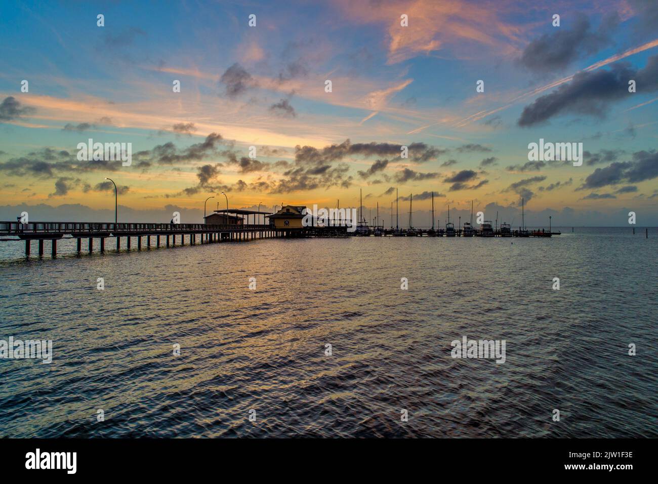 The Fairhope, Alabama municipal pier at sunset Stock Photo - Alamy