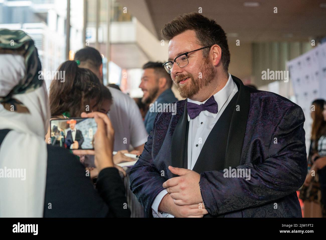 Thomas Ridgewell talks to fans at 2022 Buffer Festival red carpet Stock ...