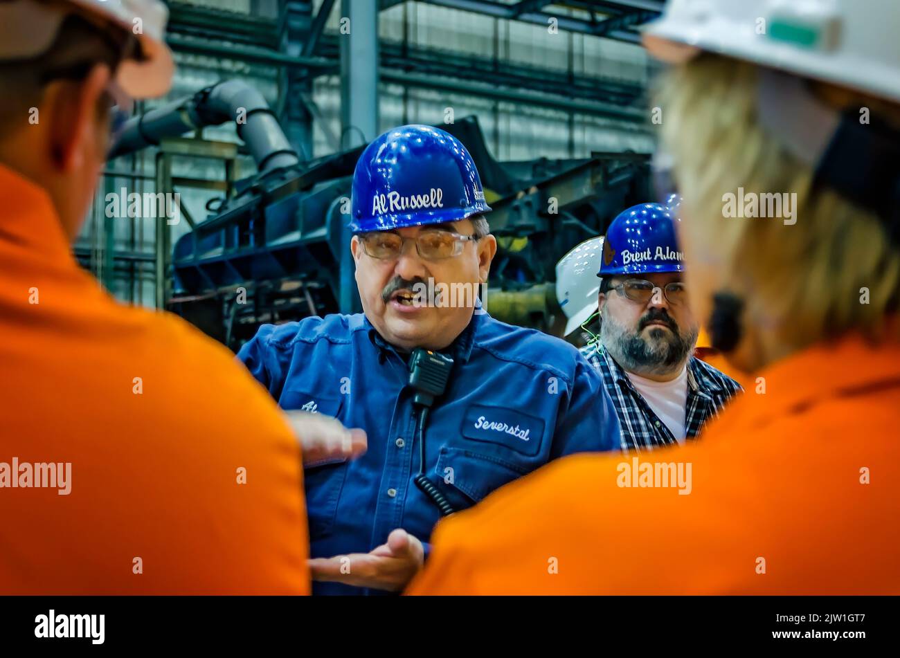 A Severstal employee explains the steel-making process during an open ...