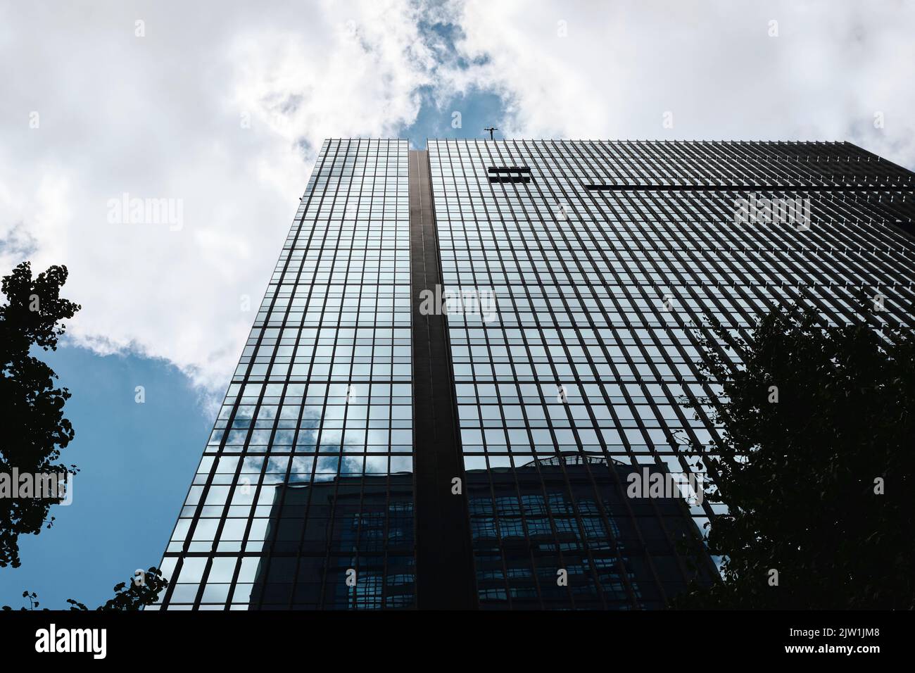 Urban Office Building Closeup with Cloudy Sky Stock Photo - Alamy