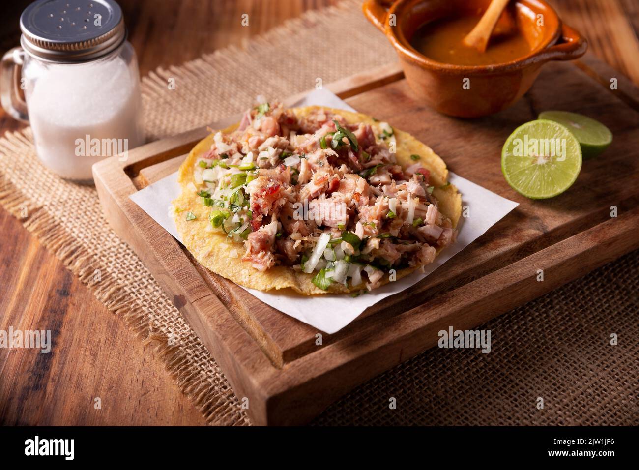 Taco de Carnitas. Cornmeal tortilla with deep fried pork. Traditional ...