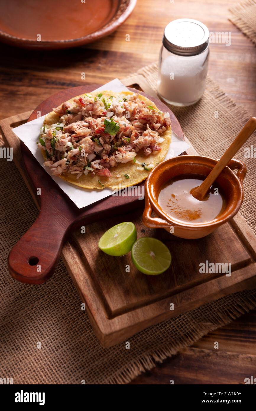 Taco de Carnitas. Cornmeal tortilla with deep fried pork. Traditional ...