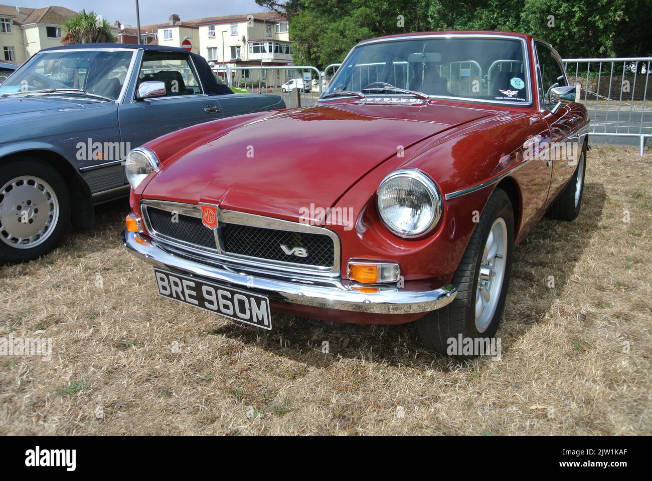 A 1974 MG BGT V8 sports car parked on display at the English Riviera ...