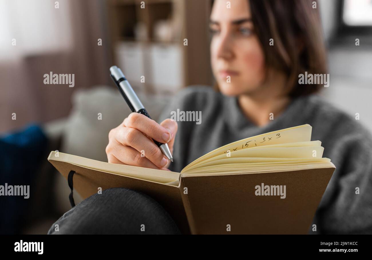 Person sad writing journal hi-res stock photography and images - Alamy