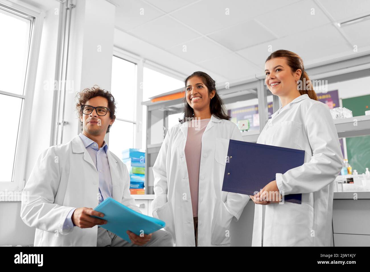 international group of scientists in laboratory Stock Photo - Alamy