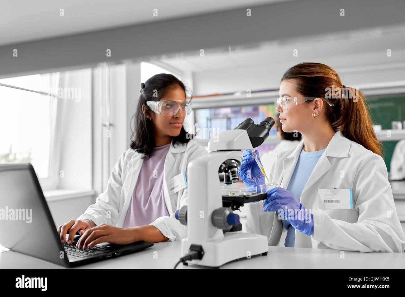 Laboratory worker working microscope chemical hi-res stock photography ...