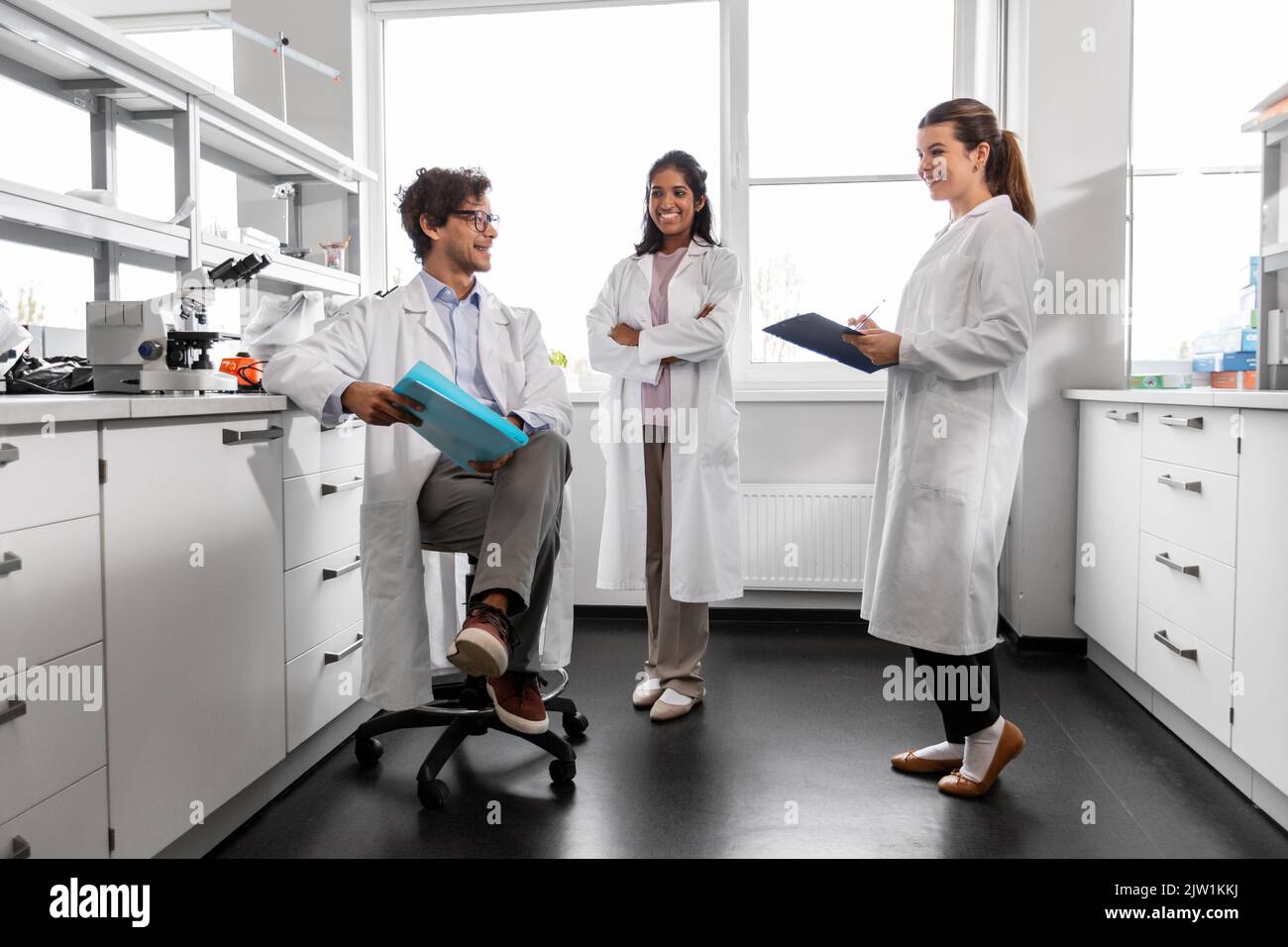 international group of scientists in laboratory Stock Photo - Alamy