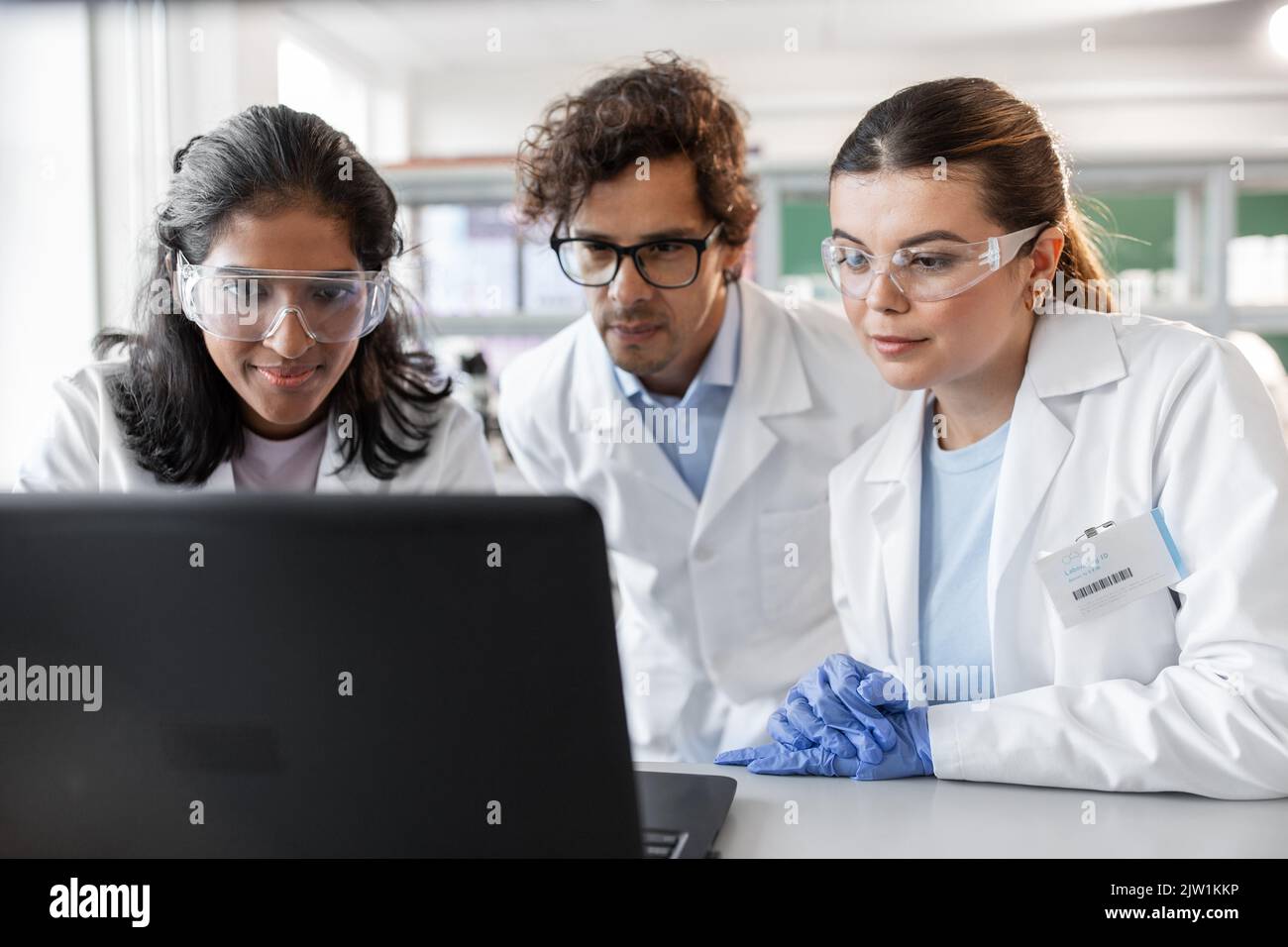 Female scientist working laptop hi-res stock photography and images - Alamy