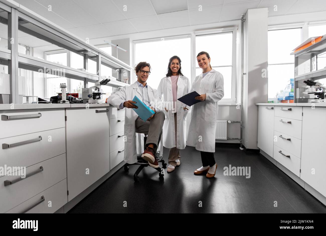 international group of scientists in laboratory Stock Photo - Alamy