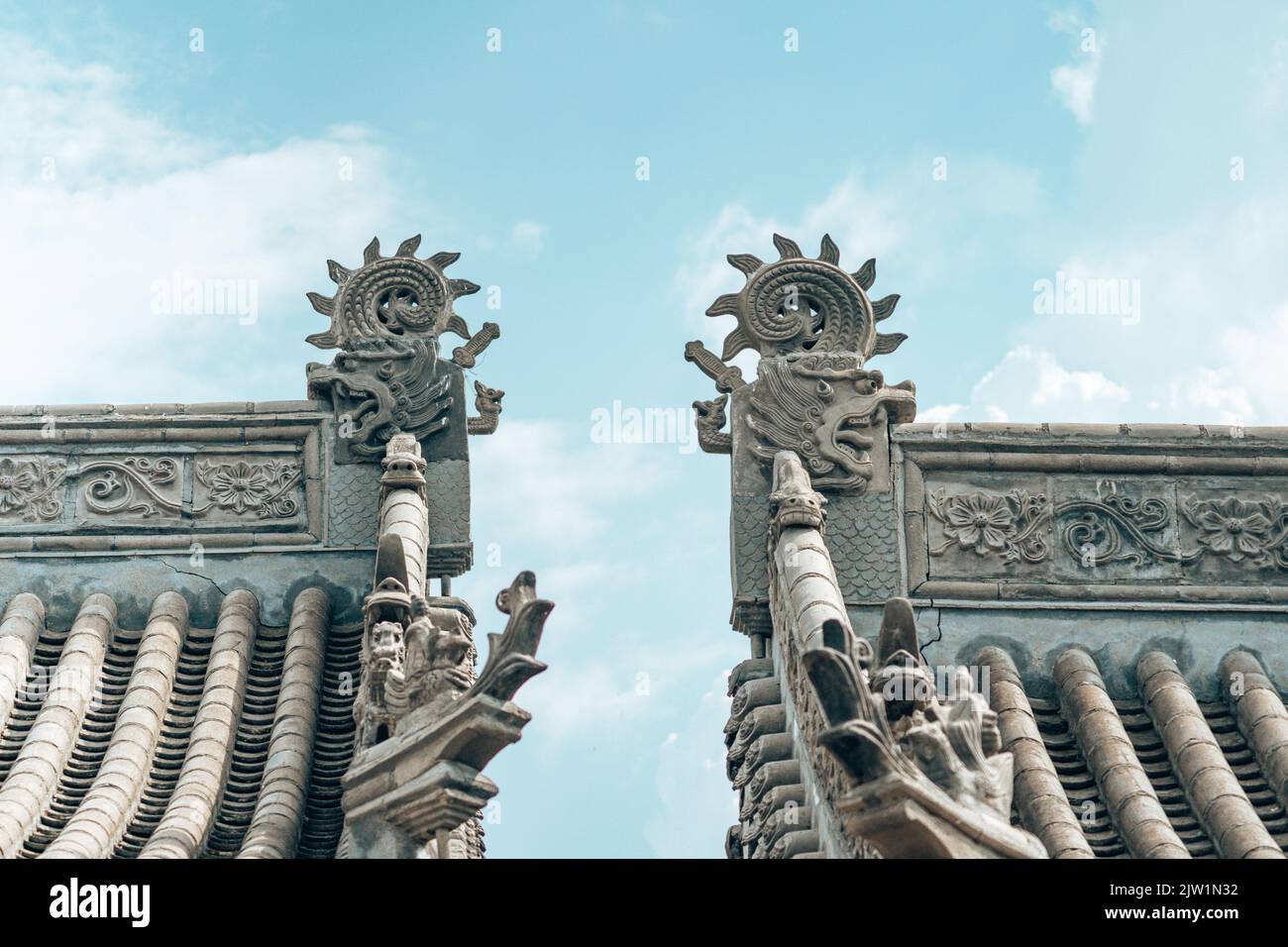 A close up of carvings on columns of mythological and religious ...