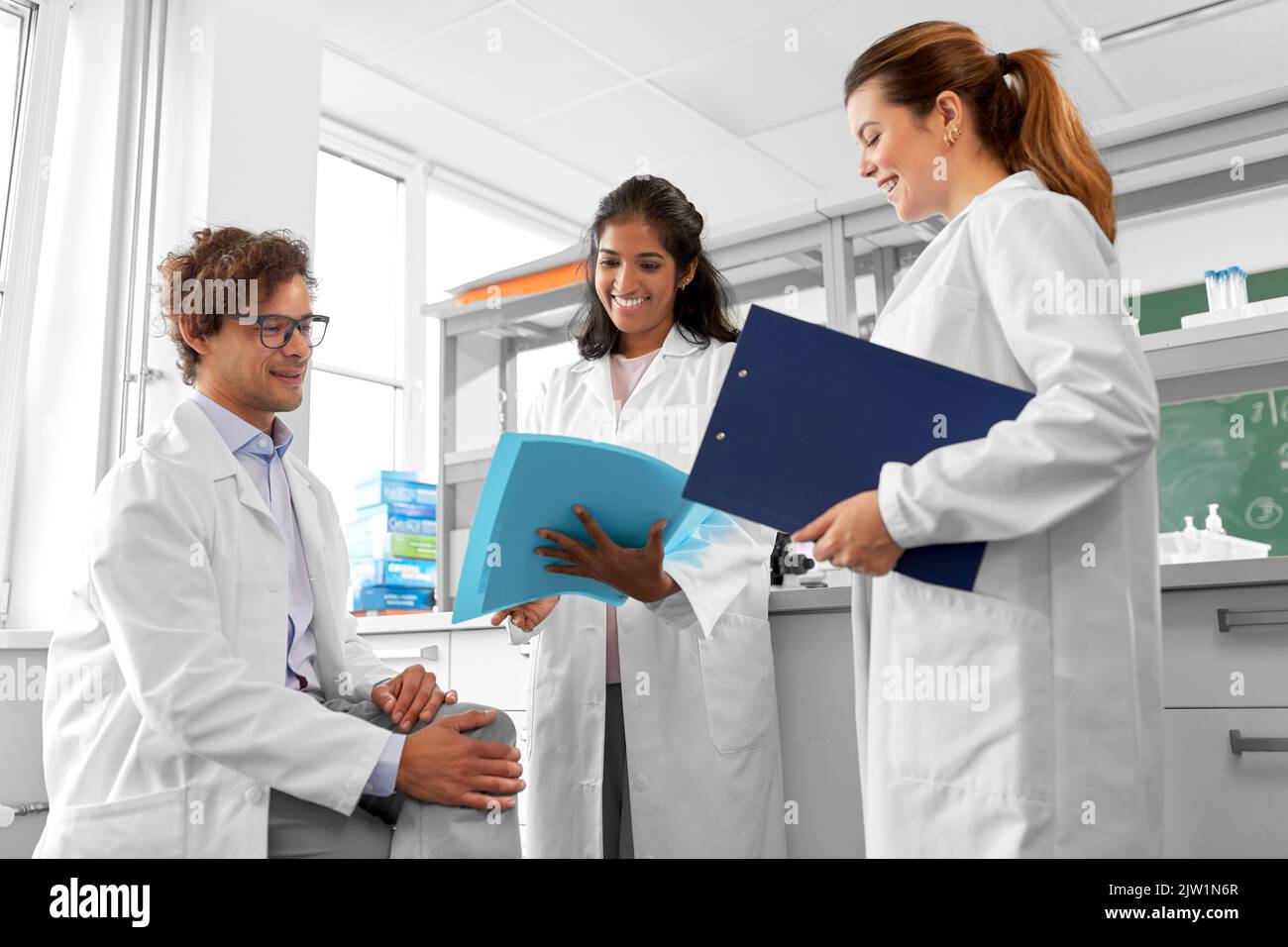 international group of scientists in laboratory Stock Photo - Alamy