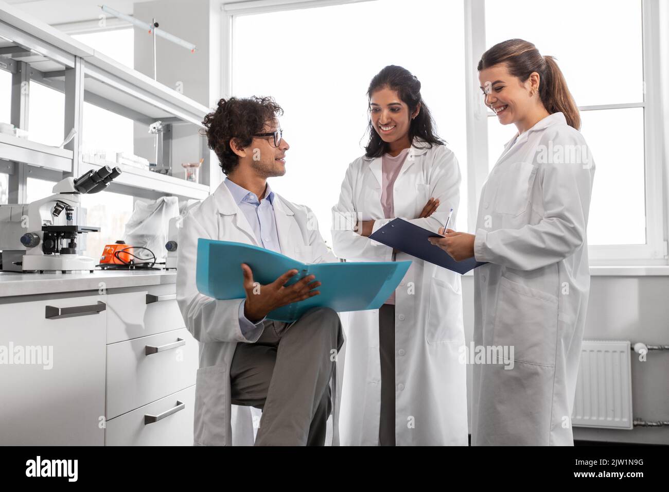international group of scientists in laboratory Stock Photo - Alamy