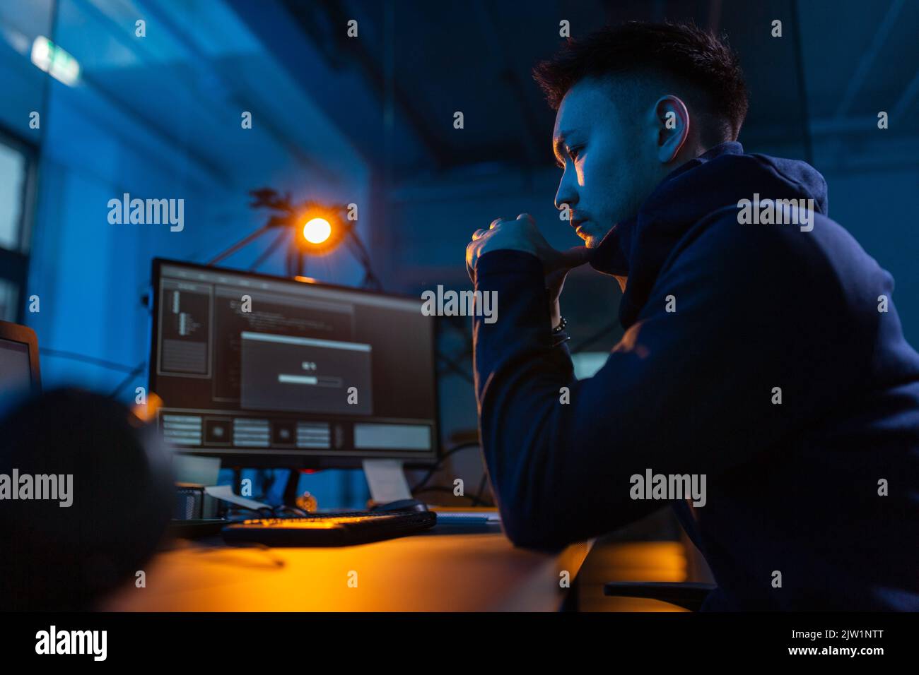 Male hacker waiting virus breach hi-res stock photography and images ...