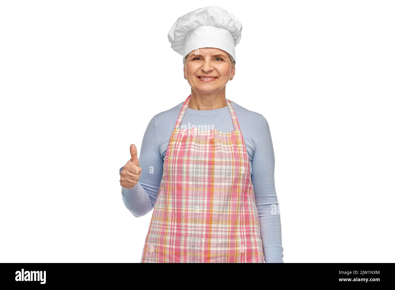 smiling senior woman or chef in toque in apron Stock Photo - Alamy