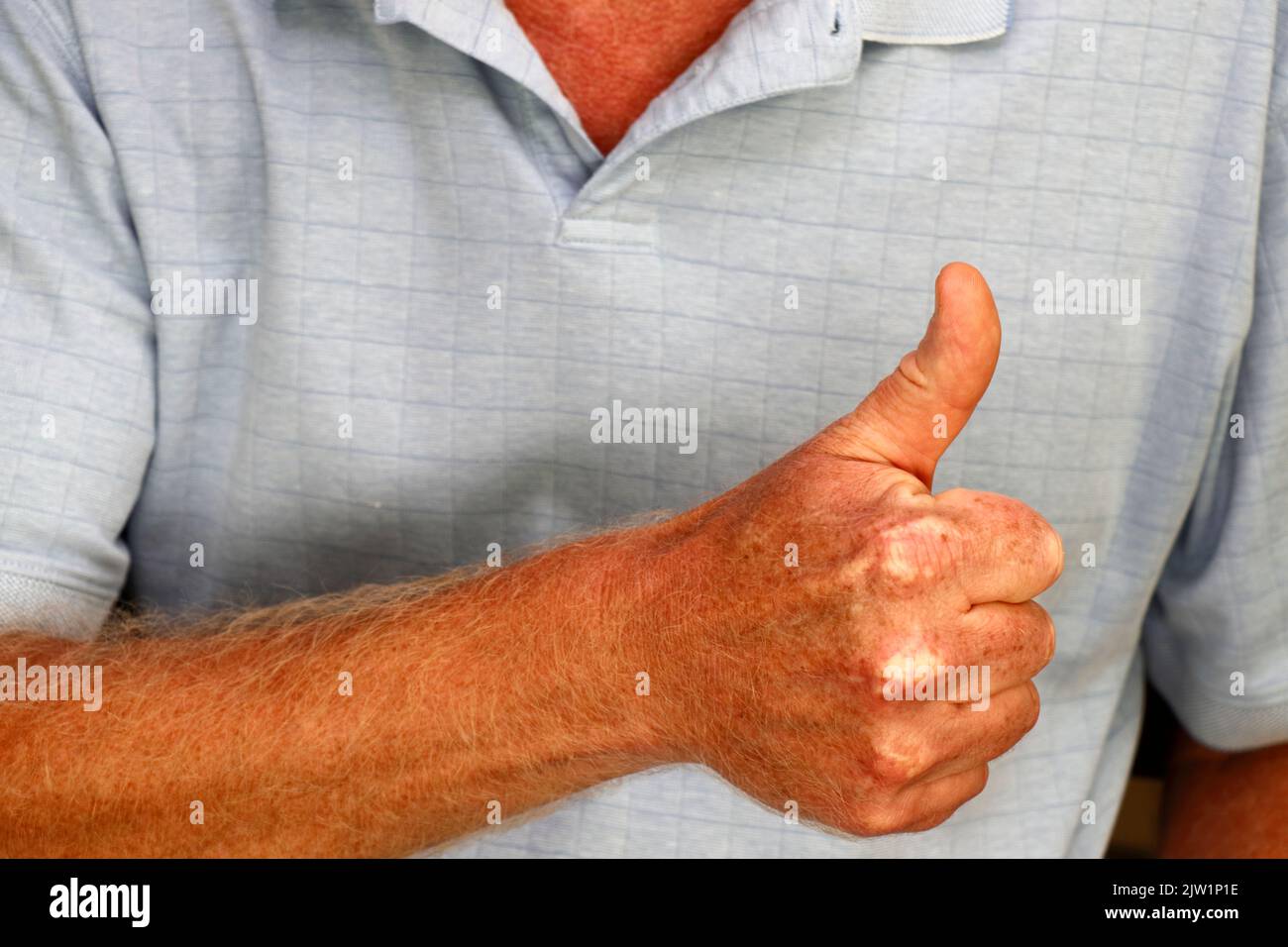 One right hand of an adult male caucasian expressing goodness with his ...