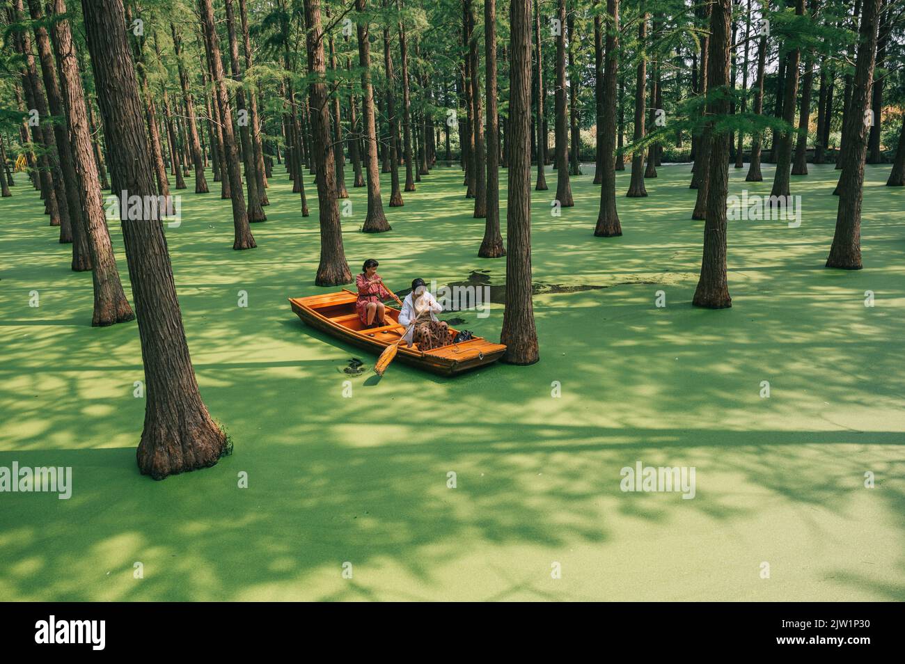YANGZHOU, CHINA - SEPTEMBER 1, 2022 - Tourists take a boat ride in the ...