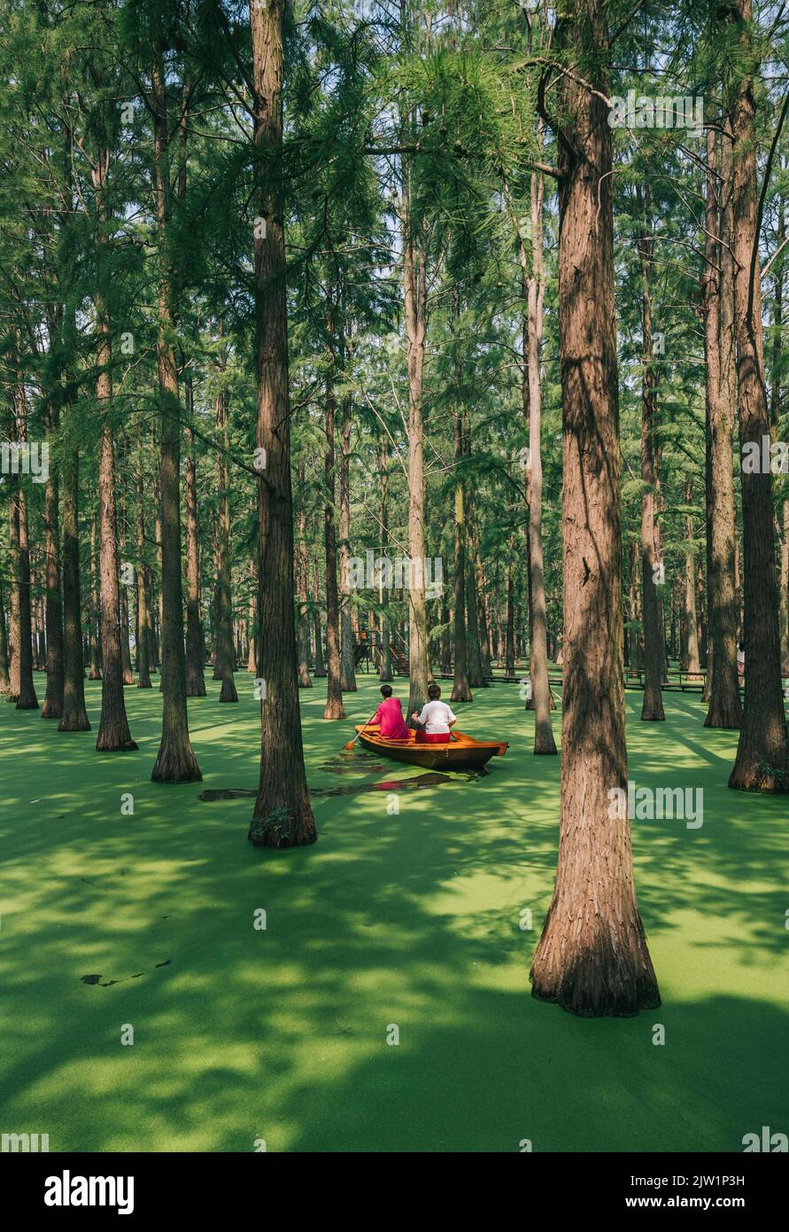 YANGZHOU, CHINA - SEPTEMBER 1, 2022 - Tourists take a boat ride in the ...
