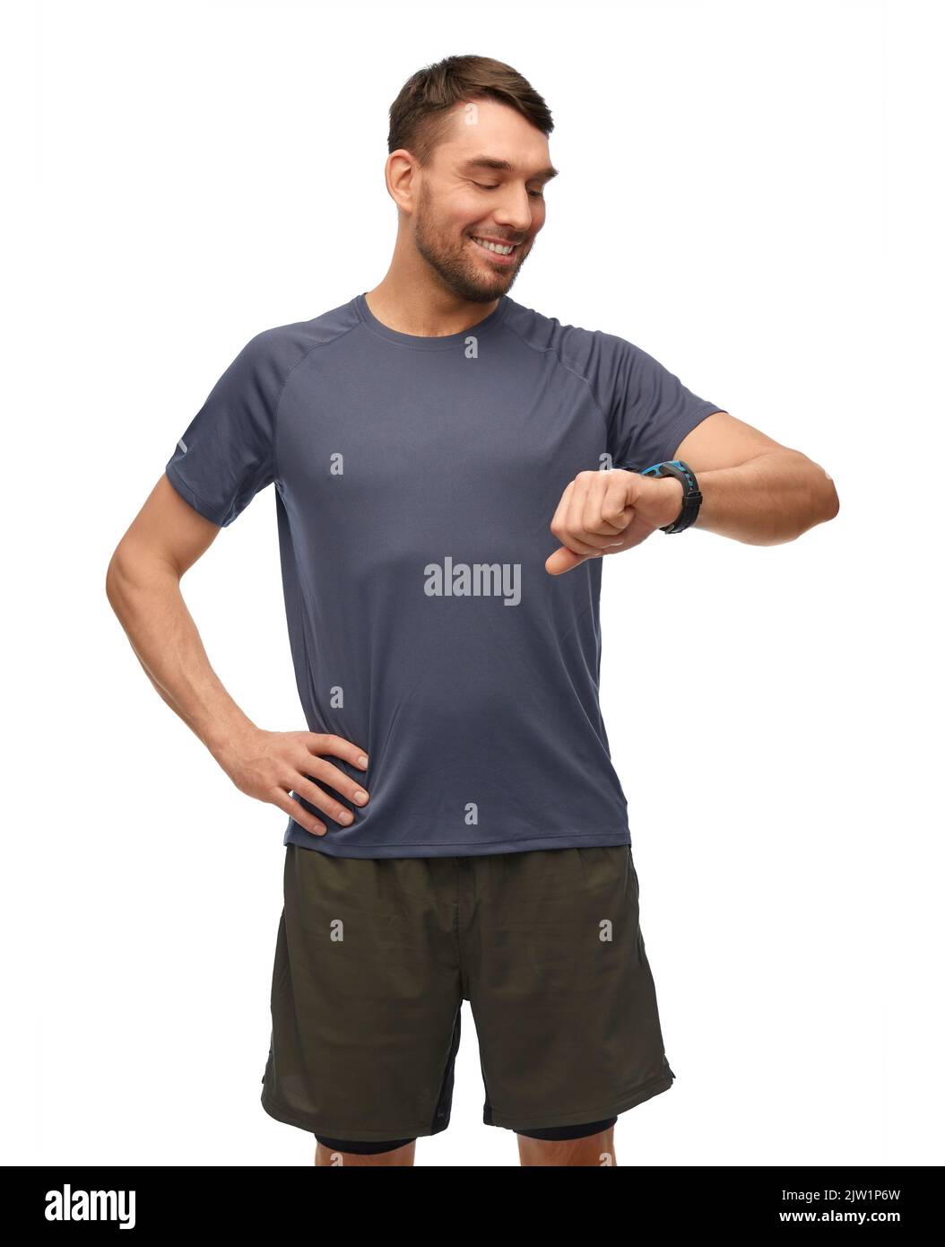 smiling man with smart watch or fitness tracker Stock Photo - Alamy