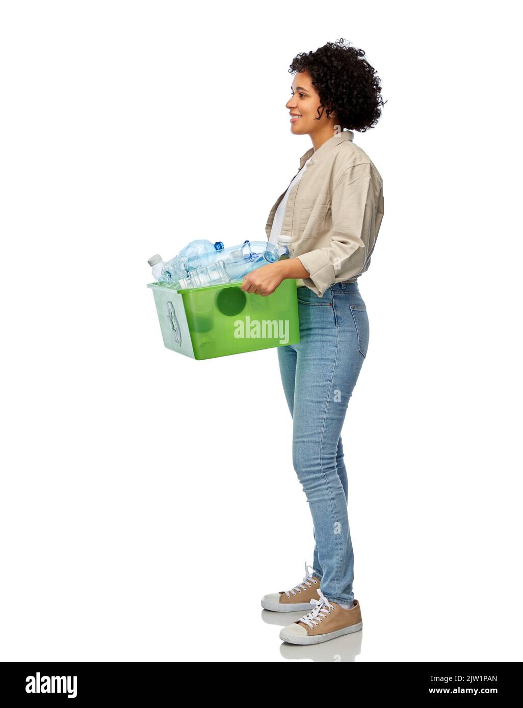 smiling woman sorting plastic waste Stock Photo - Alamy