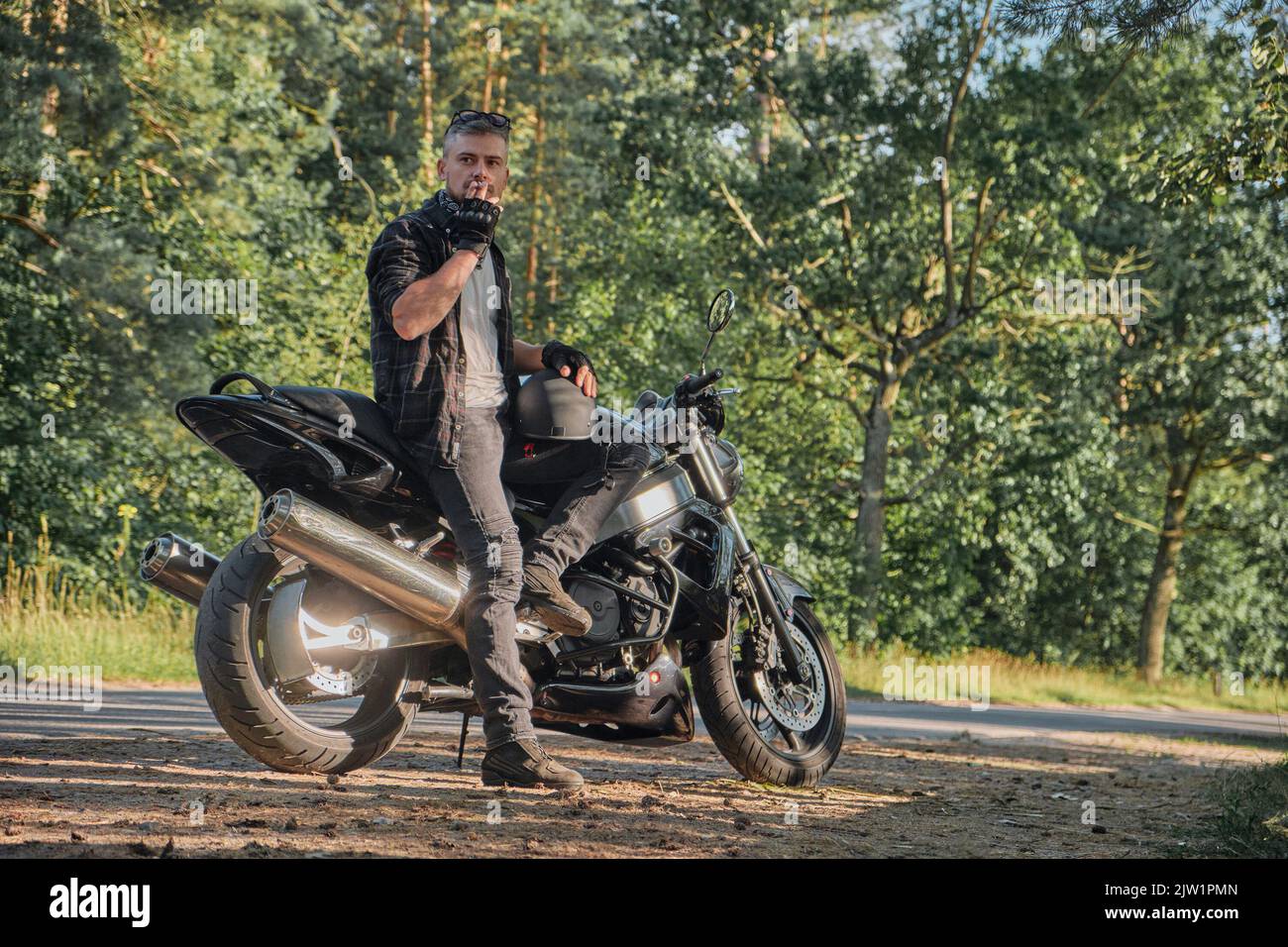 Biker smoking hi-res stock photography and images - Alamy