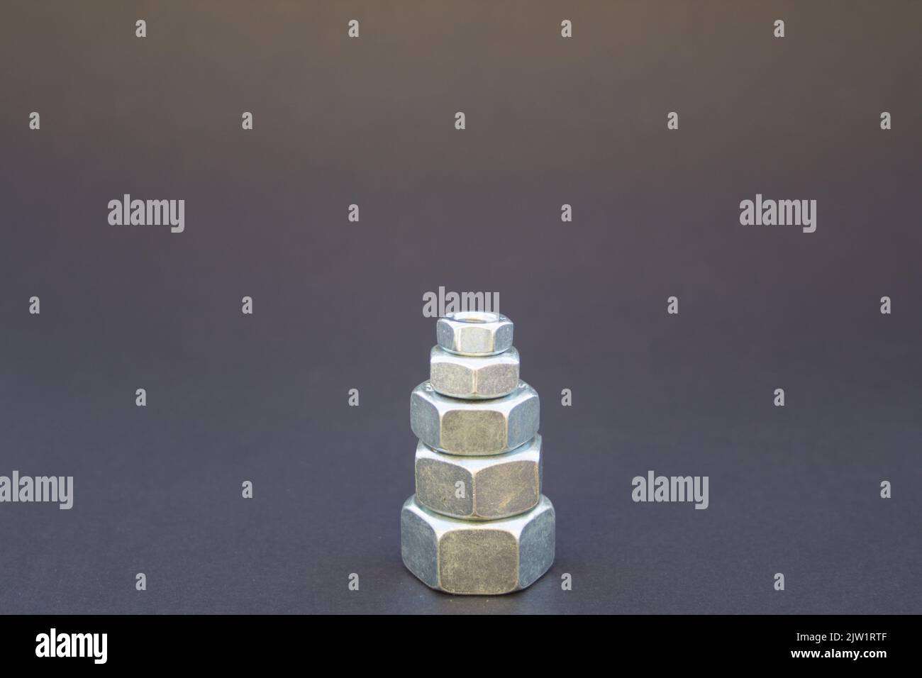 Image of a pyramid of mechanics dice on a black background Stock Photo ...