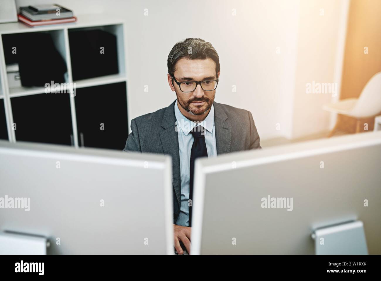 The connected employee is a productive employee. a mature businessman ...