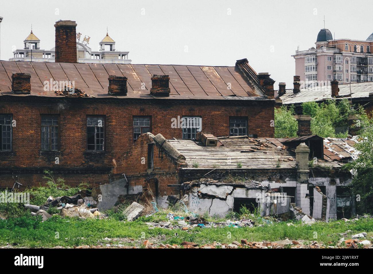 A site with a house and the ruins of another house by its side Stock ...