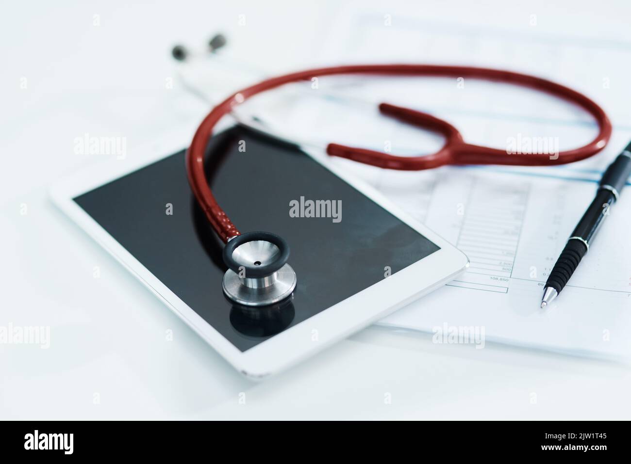 All the tools to make sure youre in good health. a stethoscope and a ...