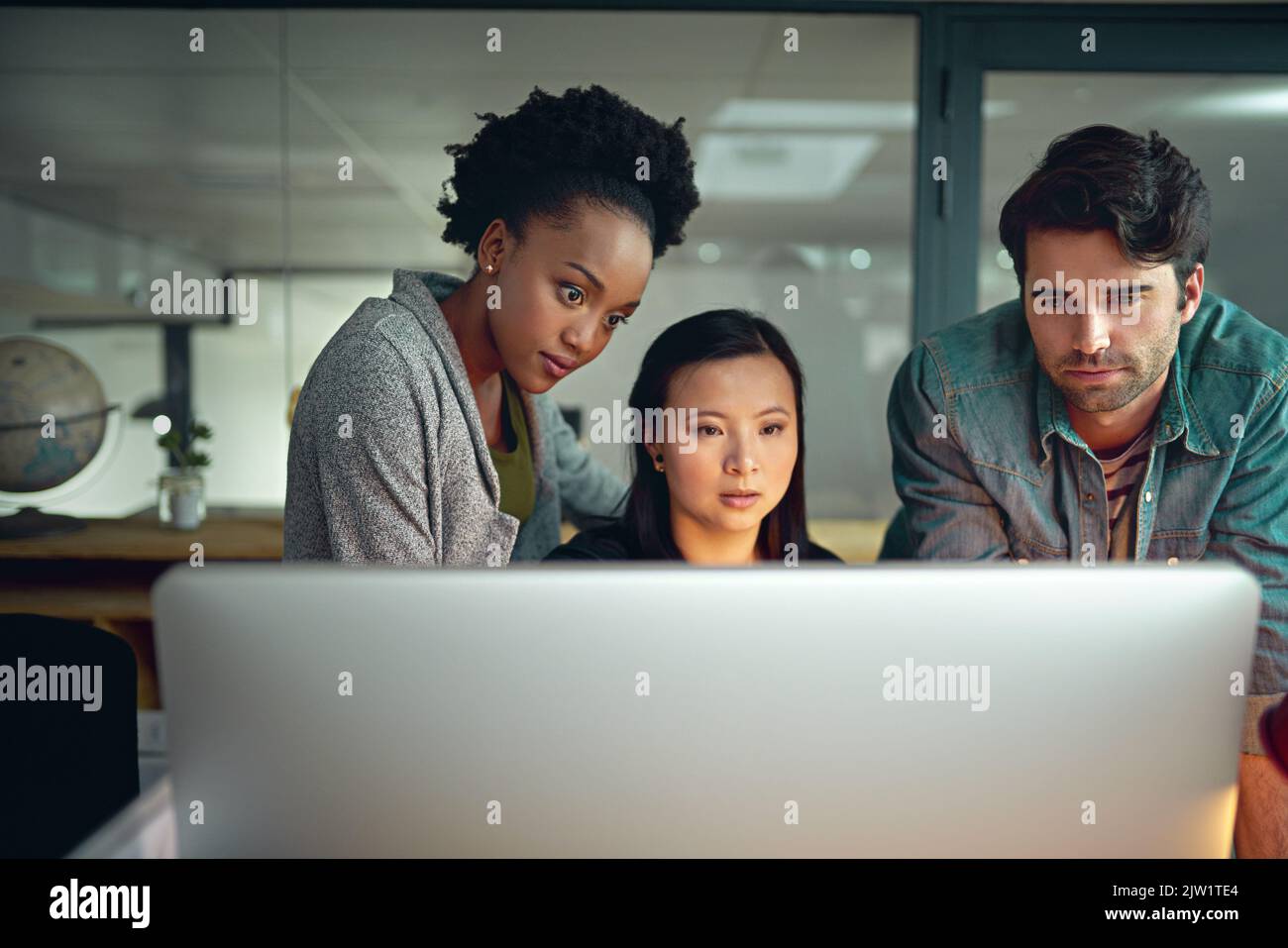 Coming together to create something new. three young designers working ...