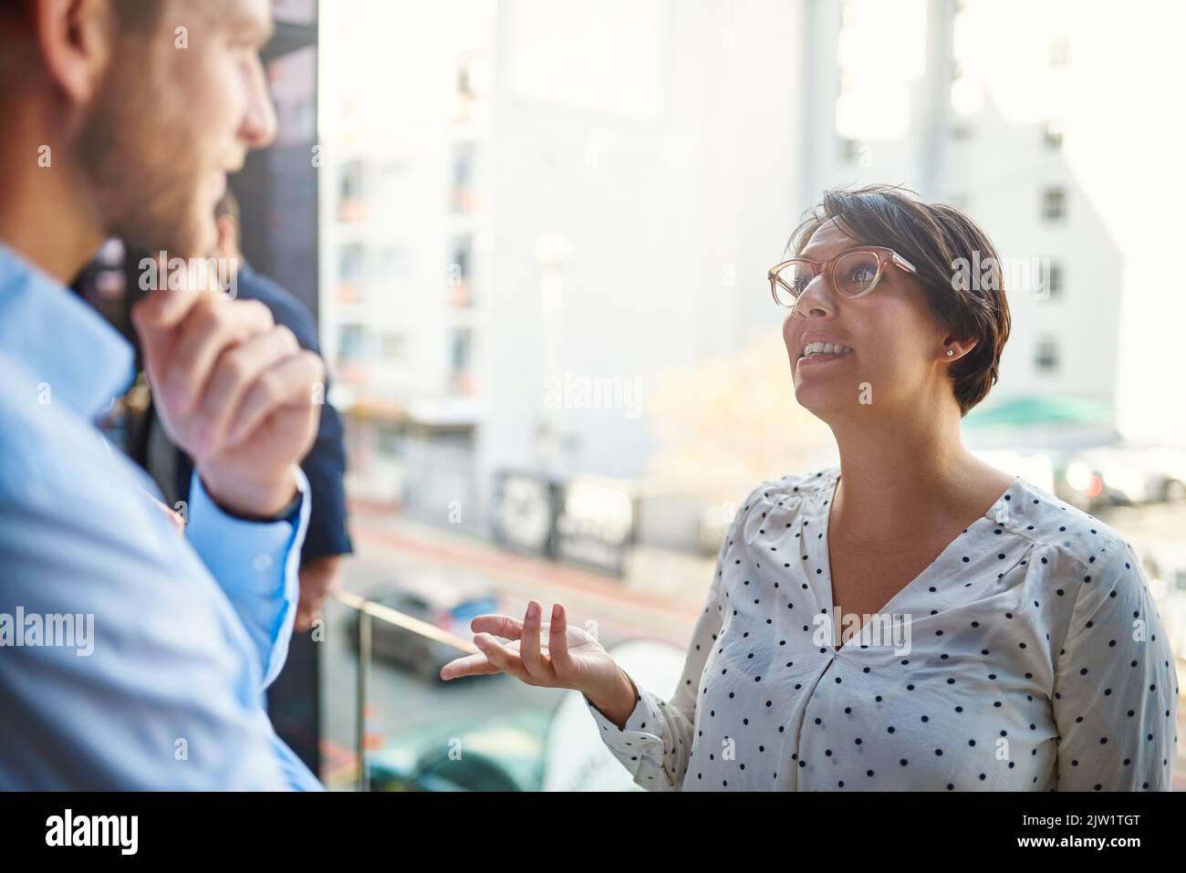 These are my thoughts on the matter. two businesspeople having a ...