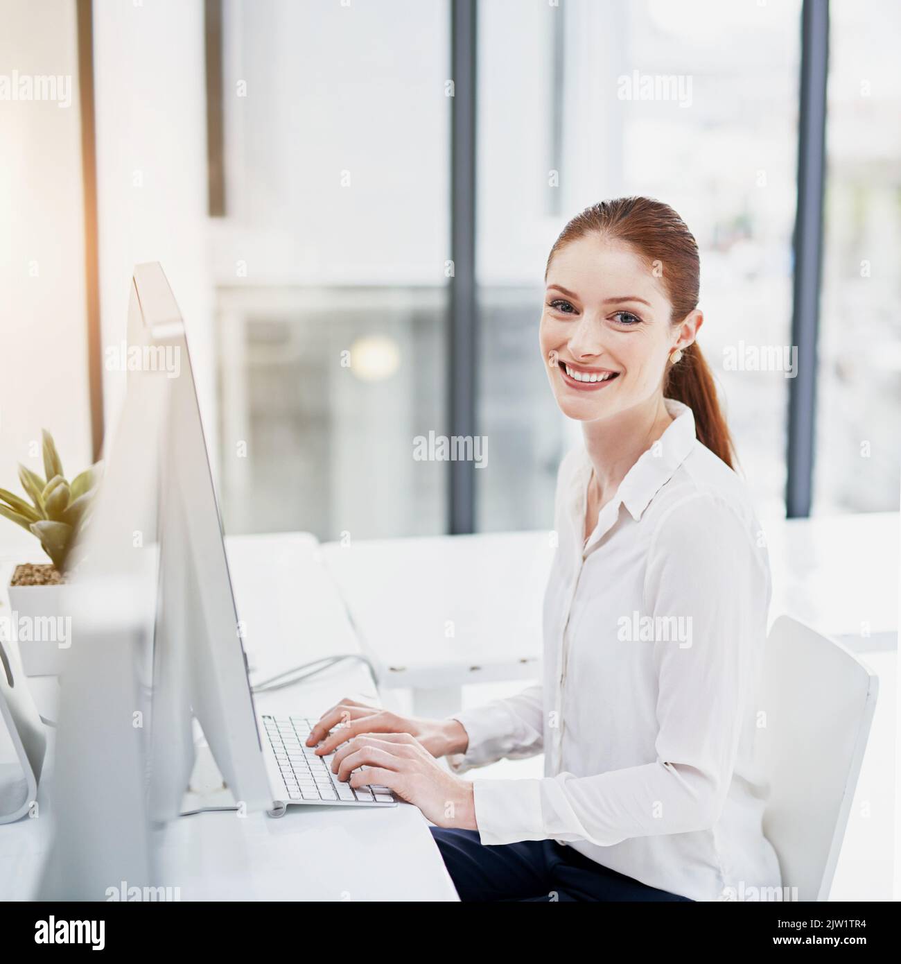 She has the right attitude to do the job. Portrait of a businesswoman ...
