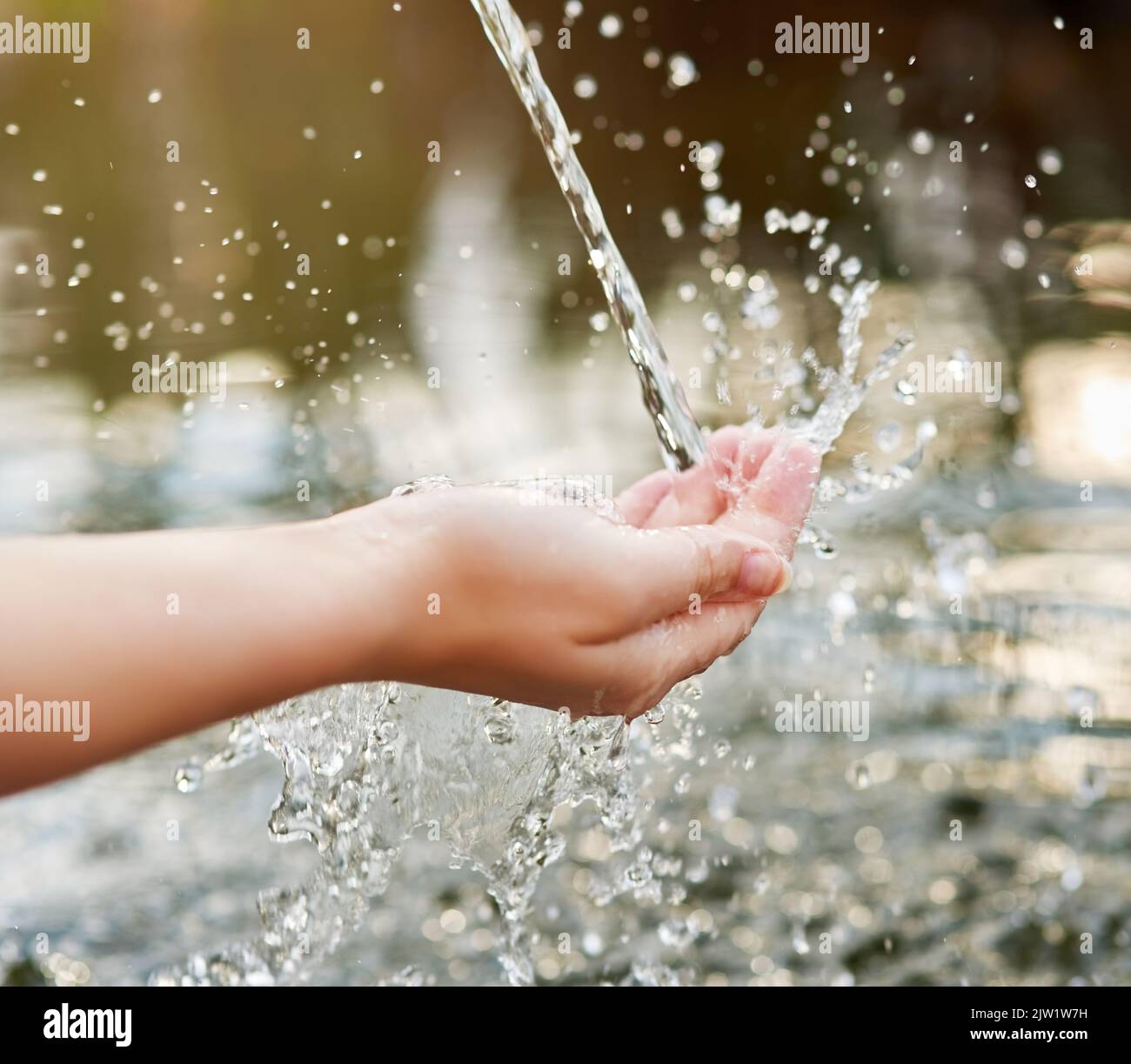 He hands out water hi-res stock photography and images - Alamy